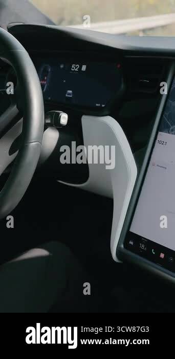 Ukraine Lviv 20.09.2023 Driver in Modern Electric Vehicle, Man in a ...