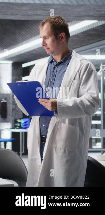 Vertical Video Bio science expert focuses on experiment data in a ...