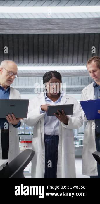 Vertical Video Portrait of diverse group of researchers in the ...
