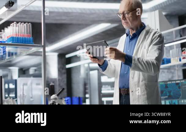 Scientist working in a laboratory workspace with biotechnology and ...