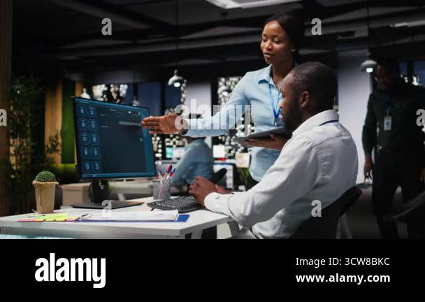 African american IT specialists using web AI assistant to automate text generation and solve ...