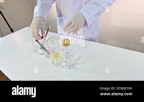 Scientist conducts a bromothymol blue experiment, observing color ...