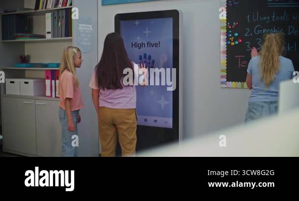 Students Interact With AI Mood Tracker in Modern Class. Girls Use AI ...