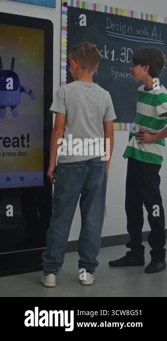 Schoolboy Uses Interactive Digital Screen, Talks Classmate. Boys Study ...