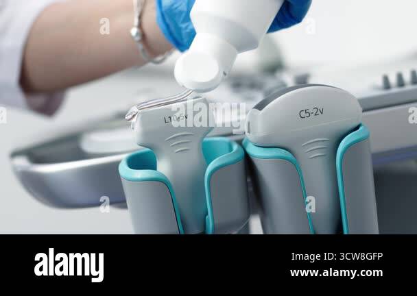 Applying disinfectant liquid onto medical ultrasound probes Stock Video ...