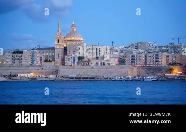 A stunning day-to-night time-lapse captures Valletta illuminated ...