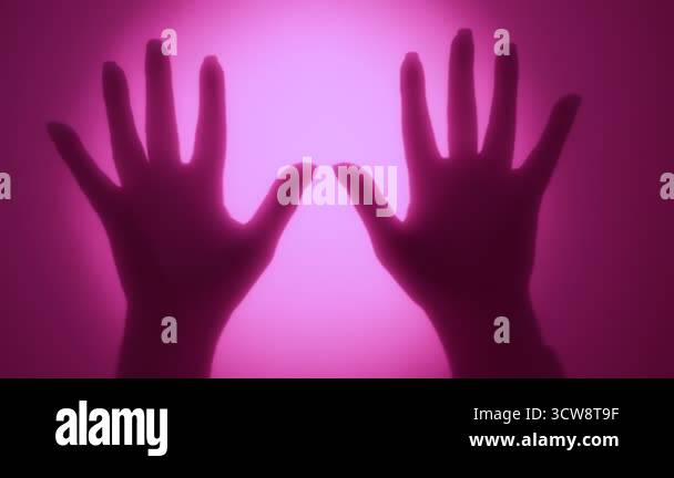 Videos of two open palms of unrecognizable lady touching background ...