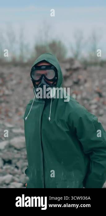 Man dancing in radioactive suit in abandoned city. Apocalyptic concept ...