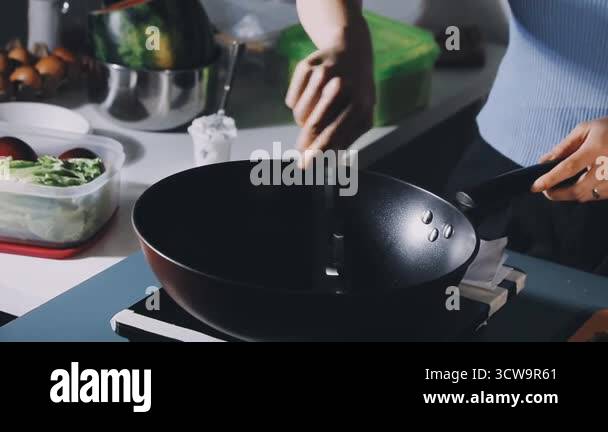 cooking in the kitchen Stock Video Footage - Alamy