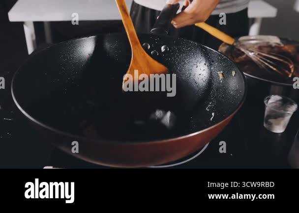 chef cooking in the stove Stock Video Footage - Alamy