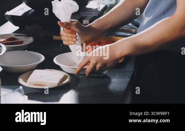 cooking in the kitchen Stock Video Footage - Alamy