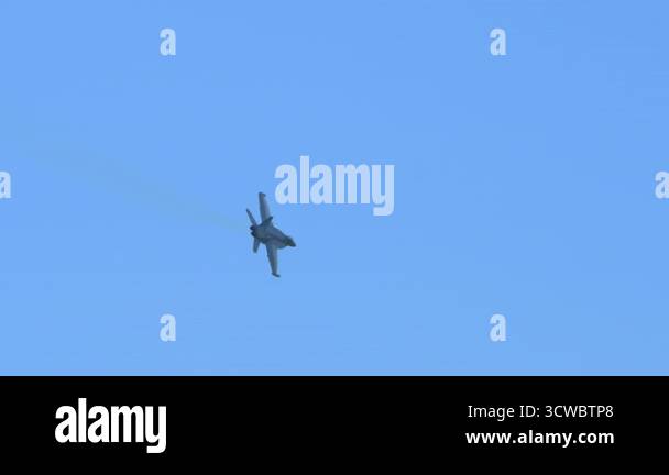 Slow motion view of F-18 fighter jets flying in the sky, showcasing ...