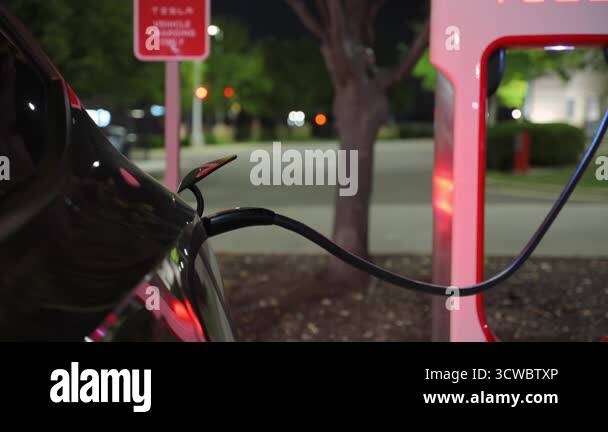 Tesla charging stop Stock Videos & Footage - HD and 4K Video Clips - Alamy