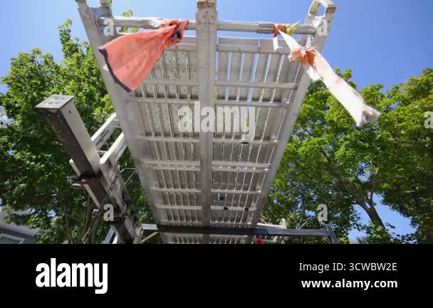 Construction scaffolding viewed from below, showing the metal platform ...