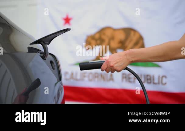 Close up of the electric car charging port. Plug in and disconnect of ...