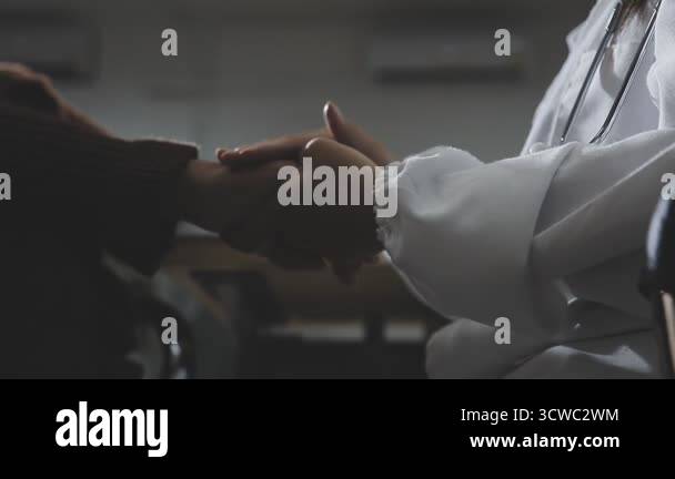 doctor and nurse shaking hands in hospital Stock Video Footage - Alamy