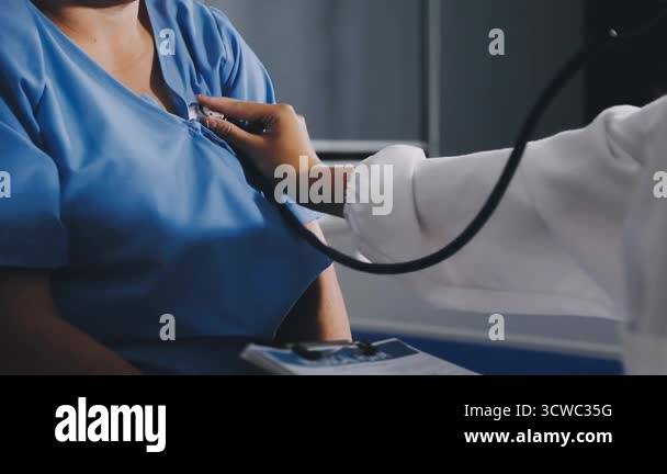 doctor checking heart rate rate on patient in the hospital room Stock ...