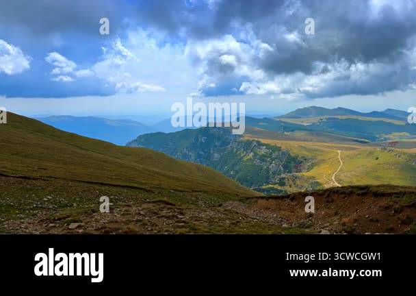 Panoramic plateau view from Bucegi Mountains. Wide plateau with trails ...