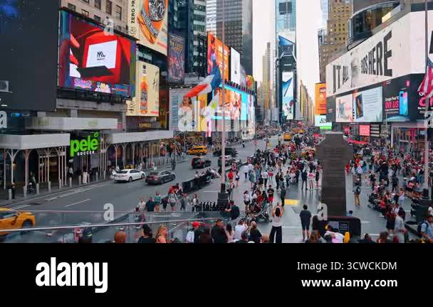 New York, USA, 1 August 2025: Times Square in New York filled with people. Multiple billboards ...