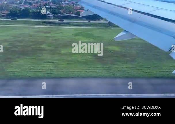 4k footage of an airplane landing down to the runway, preparing for ...
