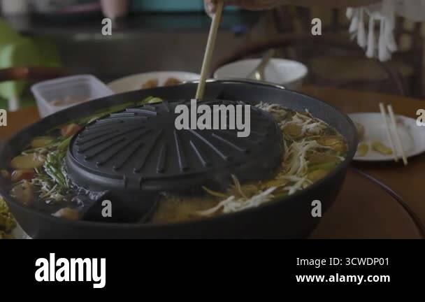 Thai Sizzling Shabu Grill On The Dinner Table, Hot Thai sizzling shabu ...