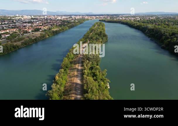Drone aerial panorama of the Rhone River with narrow island in the ...