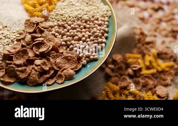 A variety of carbohydrate-rich foods, including bread, rice, wholegrain ...