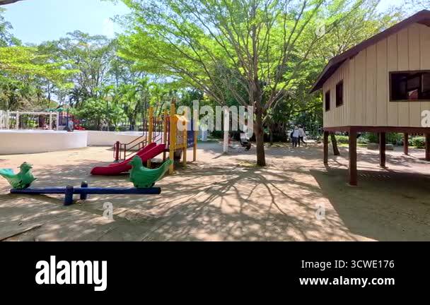 Children's playground in Bangkok with vibrant play structures under ...