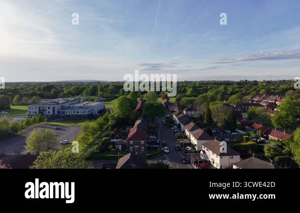 Footage captures a vibrant neighborhood in the late afternoon ...