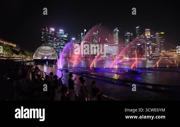 Marina Sand, Singapore - Jul 17 2024: Spectators mesmerized by vibrant ...