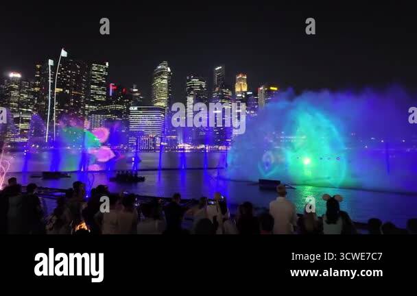 Marina Sand, Singapore - Jul 17 2024: Close-up of water jets and light ...