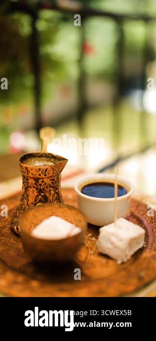 Relaxing at an outdoor cafe, savoring the rich taste of bosnian coffee ...