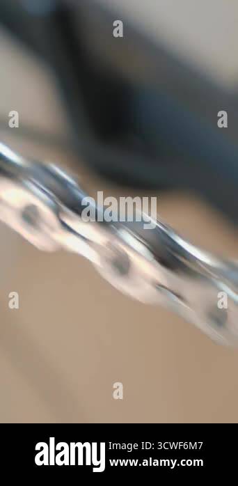 Close up of rotating bicycle chain. Bike maintenance. Bicycle mechanic ...