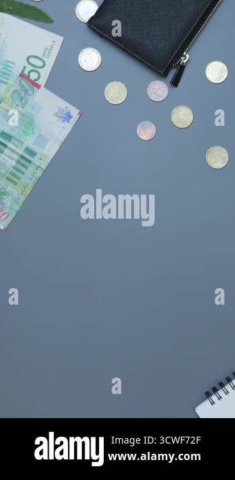 Person in protective blue glove giving pile of cash money to another ...