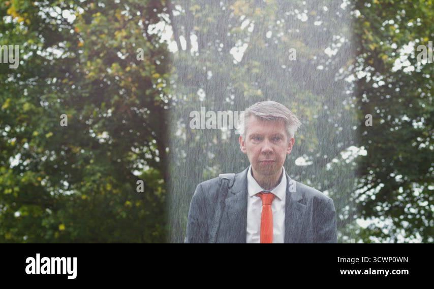 Why is it raining on me - sad businessman caught out in the rain Stock ...
