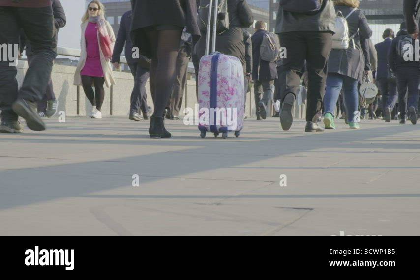 Low angle view of commuter legs at rush hour Stock Video Footage - Alamy