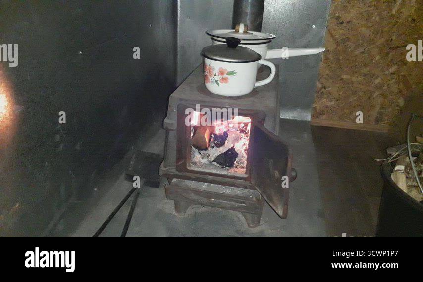 We light and burn a wood burning stove in a private house Stock Video ...