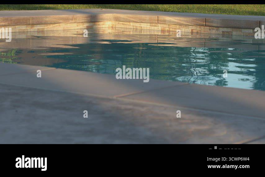 Abstract Peaceful Swimming Pool Water and Deck in Afternoon Sun Stock ...