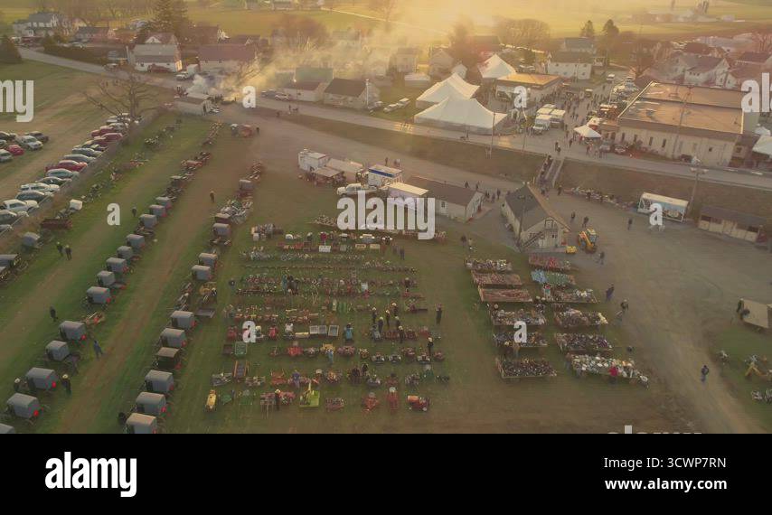 Aerial of an Early Morning View of Opening Day at an Amish Mud Sale ...