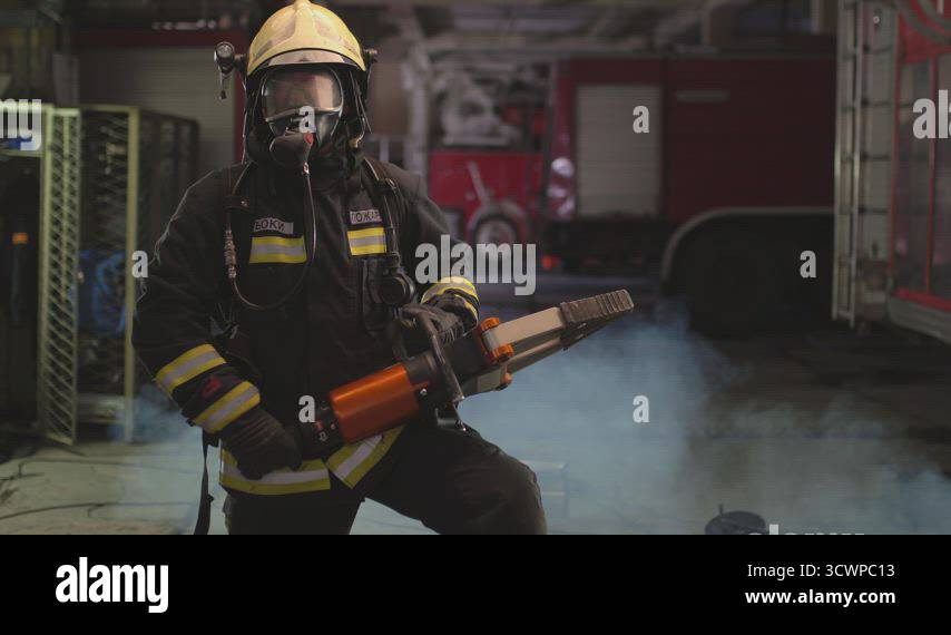 firefighter portrait wearing full equipment, oxygen mask, and emergency ...