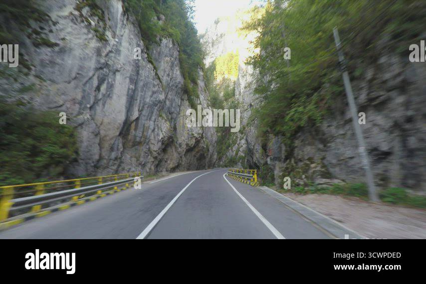 Road in Bicaz Gorge, a narrow pass between historic region of ...