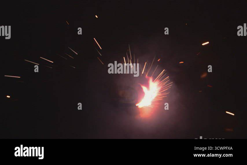 Firecracker lit in festival season of Diwali. A burning sparkler on ...