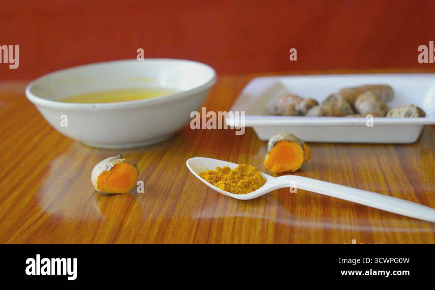 Table spoon of Pure Turmeric Haldi Powder. Anti-inflammatory and ...