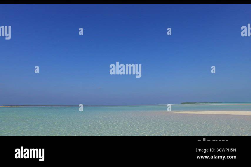 Flat sand on a shoal extending from a white sand beach in Thailand ...