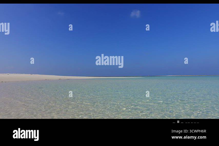 Flat sand that is gently sloping to the shallow water and amazing clear ...