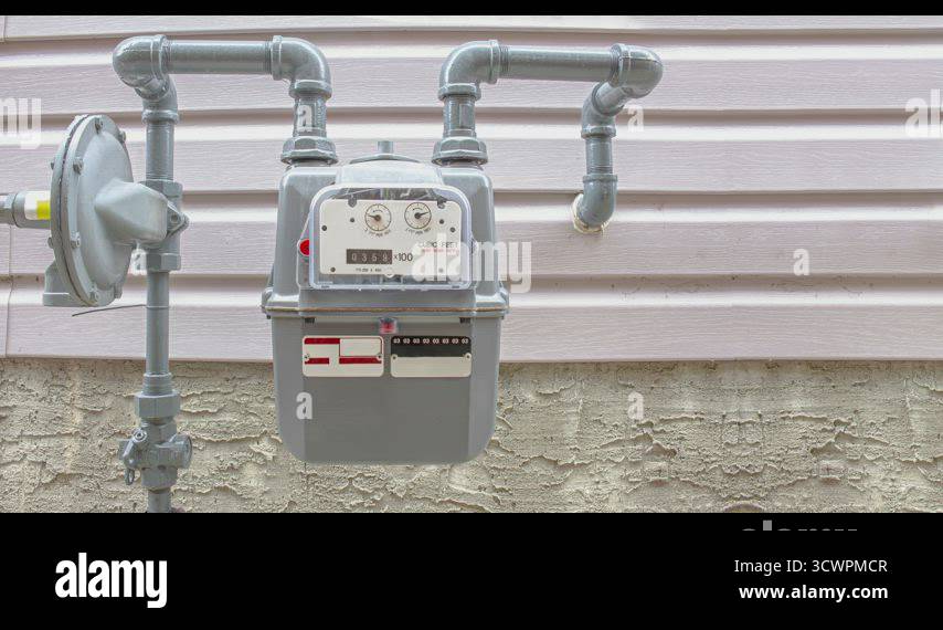 Residential urban natural gas meter, measuring gas consumption, outside ...