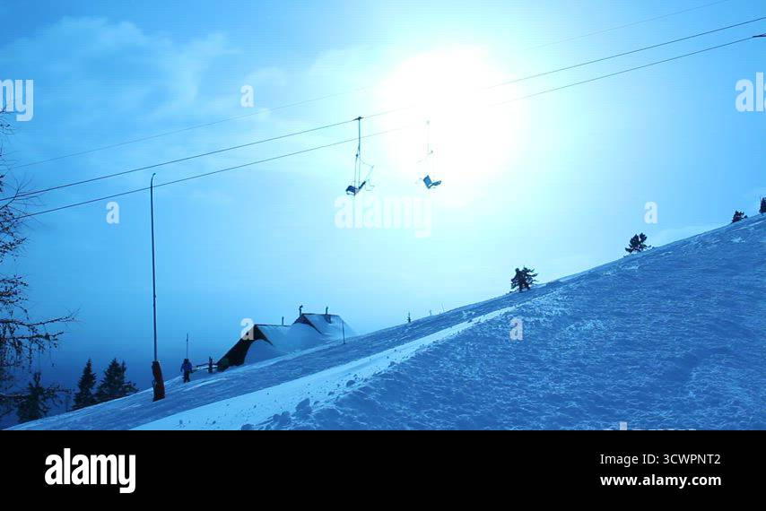 Ski lift at sunset and end of the day Stock Video Footage - Alamy