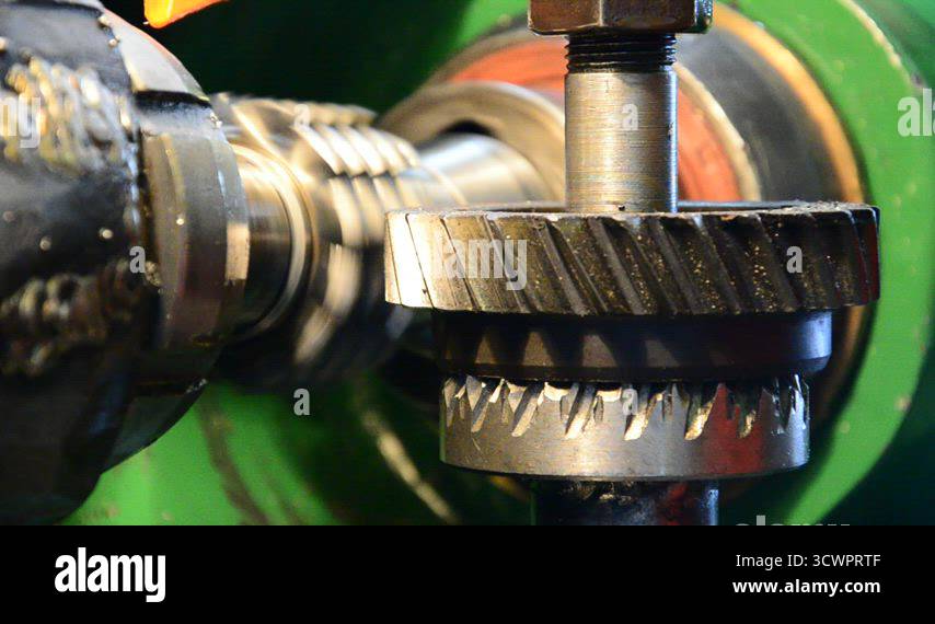cogwheel production and service industrial machine, rotating gears ...