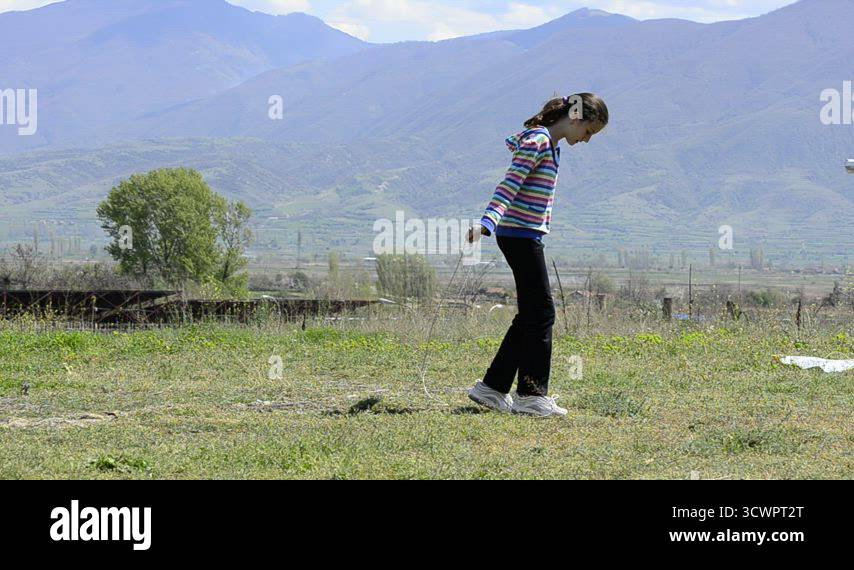 Girl skipping rope, nice exercise play Stock Video Footage - Alamy