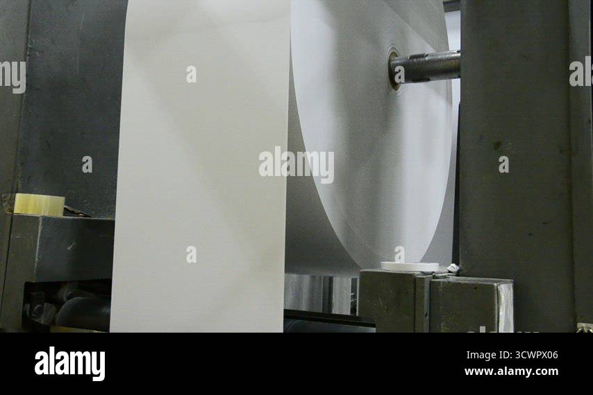 Print press plant, Huge roll of paper in feeder end on a webset bases ...